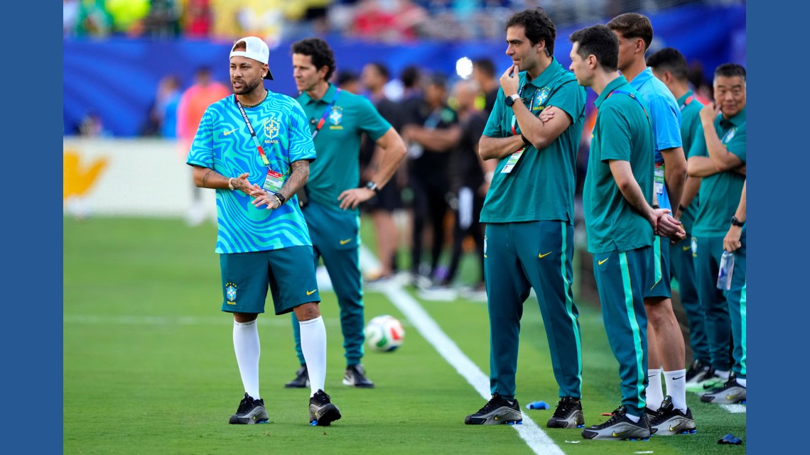 Neymar returns to action for limited training with Brazil at the World ...