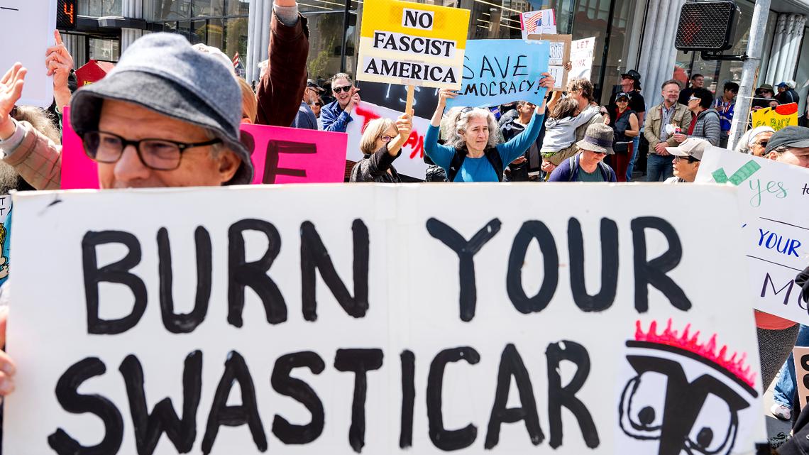 Protests against Elon Musk, DOGE swarm Tesla showrooms | kcentv.com