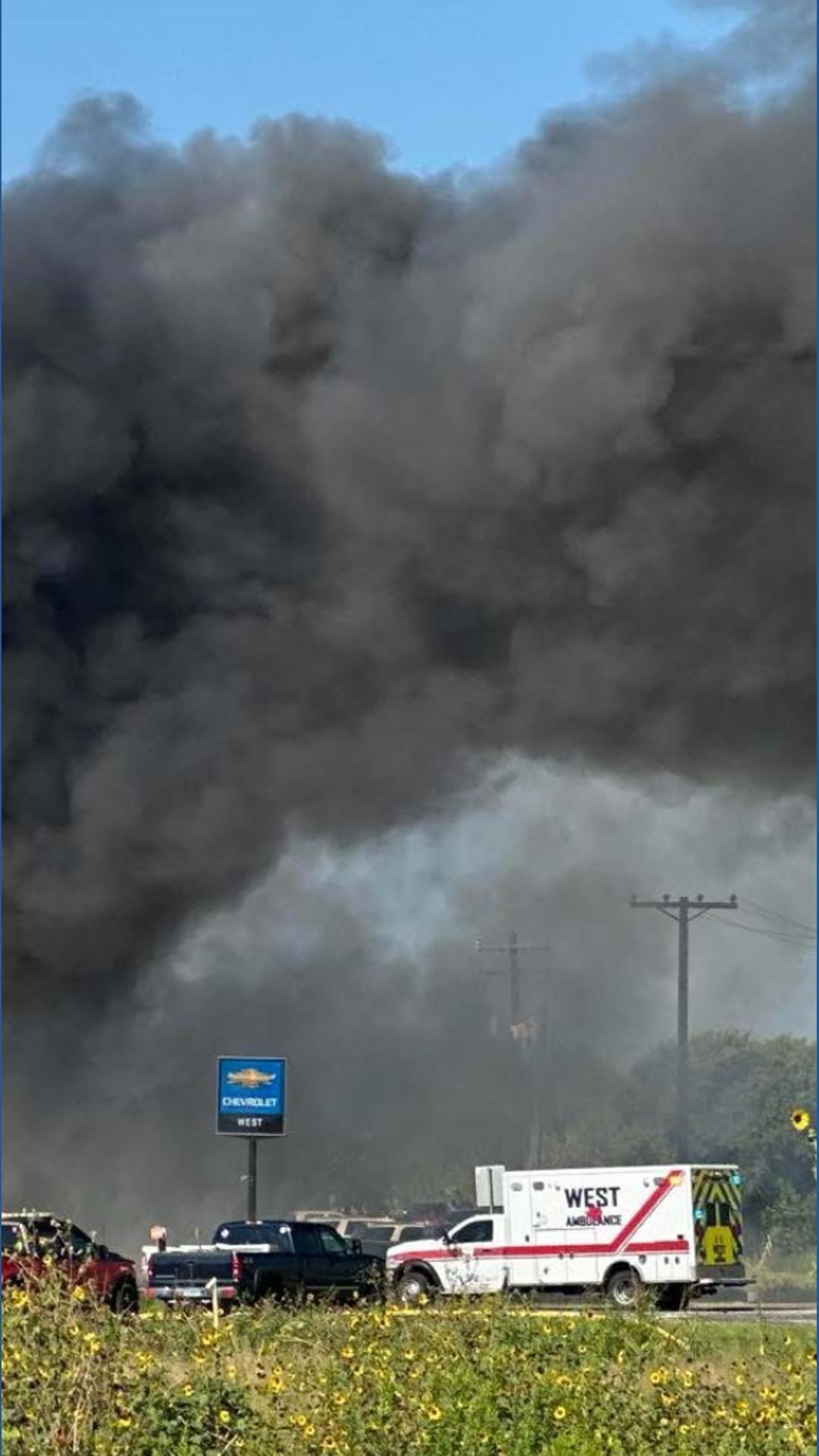 Firefighters tackle major building fire at Chevy of West dealership ...
