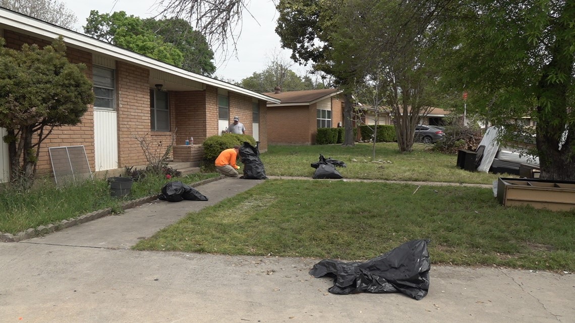Neighbors help clean up home after trash left on front lawn | kcentv.com