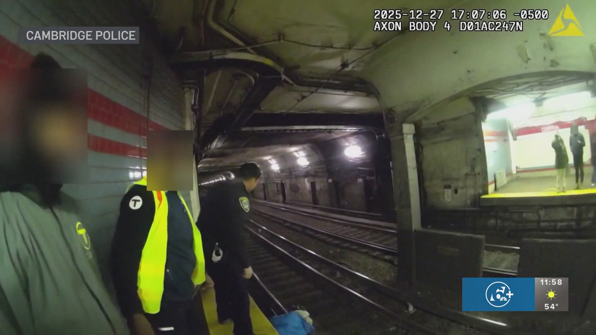 Body Cam: Officers jump onto active train tracks to rescue person stuck ...