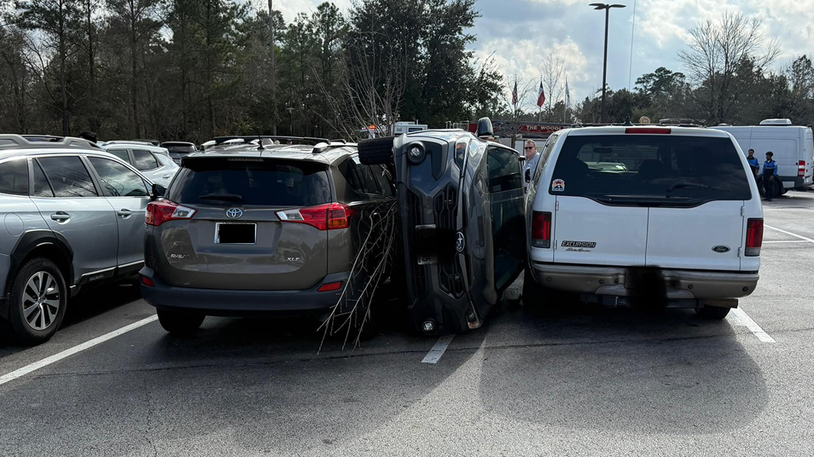 SUV flips between cars in HEB parking lot | kcentv.com